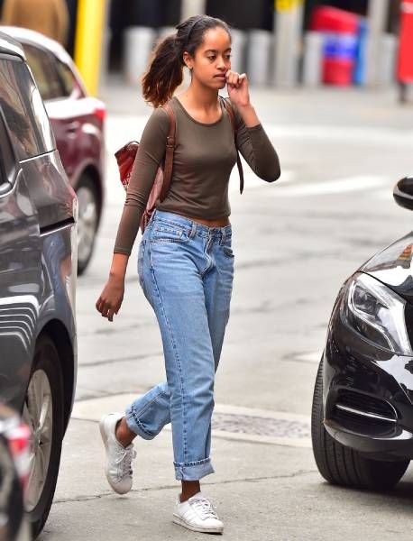 Malia Obama turns up the heat in denim hotpants as she displays very ...
