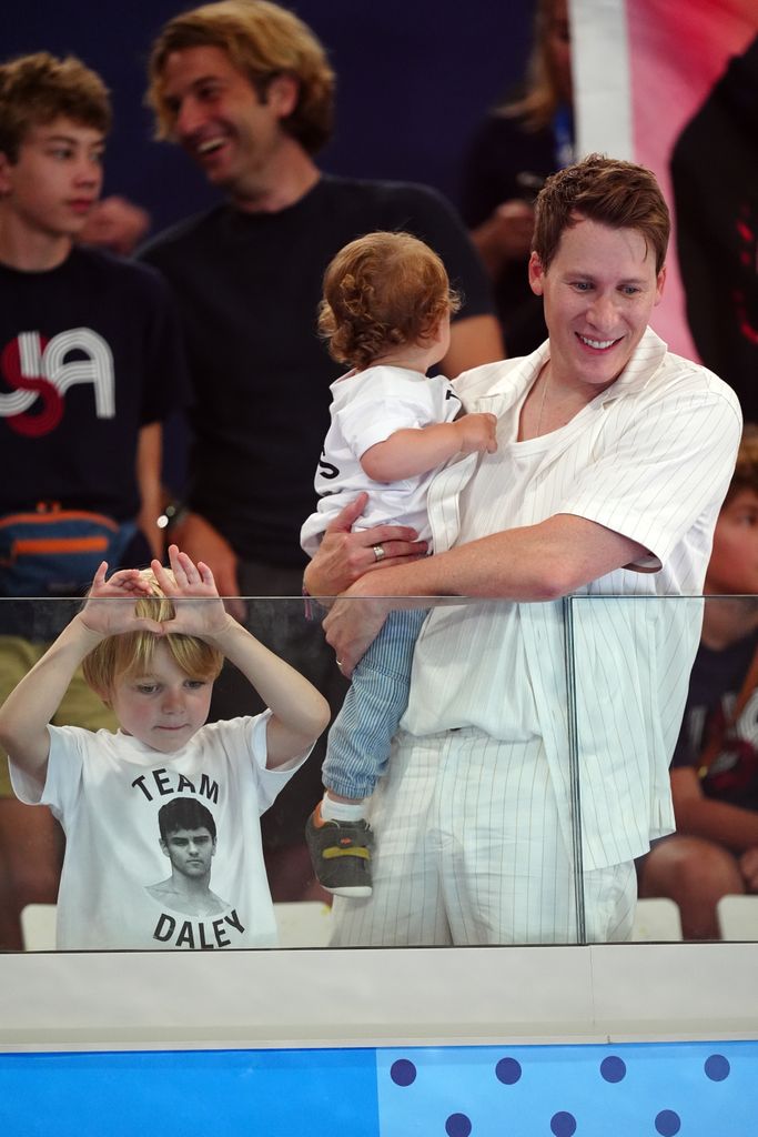 Tom Daley's rarely-seen sons look so cute to cheer on their 'papa' | HELLO!