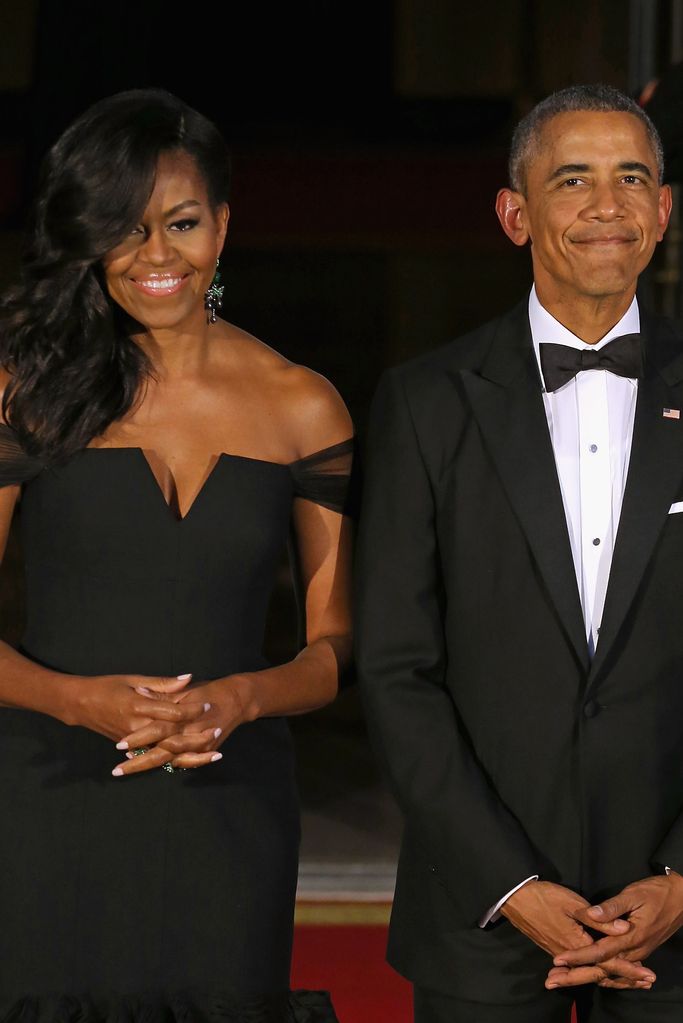 Michelle Obama wows in the boldest dress and knee-high boots for Munich ...