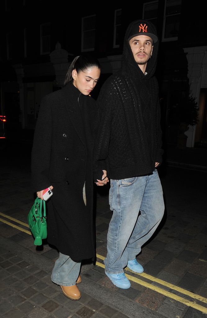 Romeo Beckham looks loved up with new girlfriend Kim Turnbill after ...