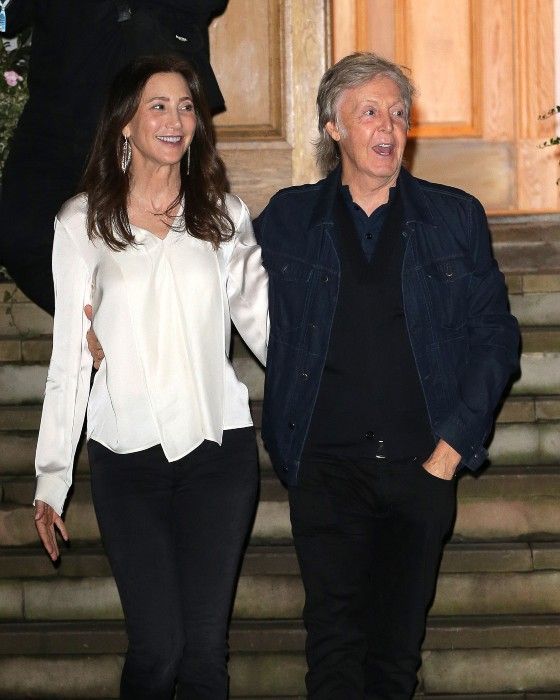 Paul McCartney and wife Nancy Shevell look so in love as they cuddle up ...