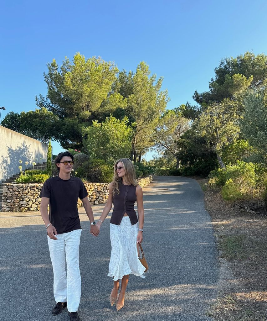 Prince Joachim of Denmark's son Count Nikolai gazes adoringly at model ...