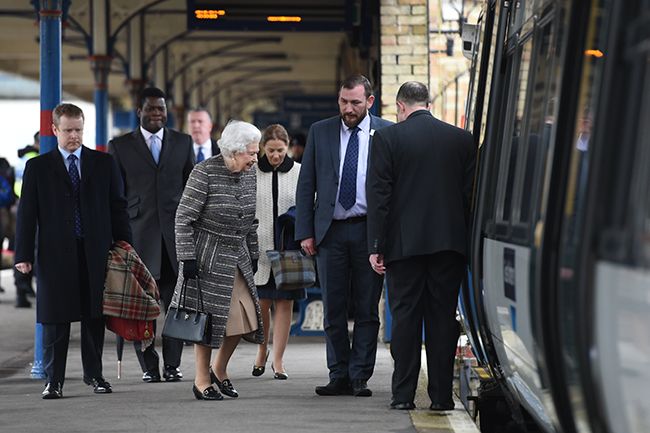 The Queen boards train for London following extended Christmas break ...