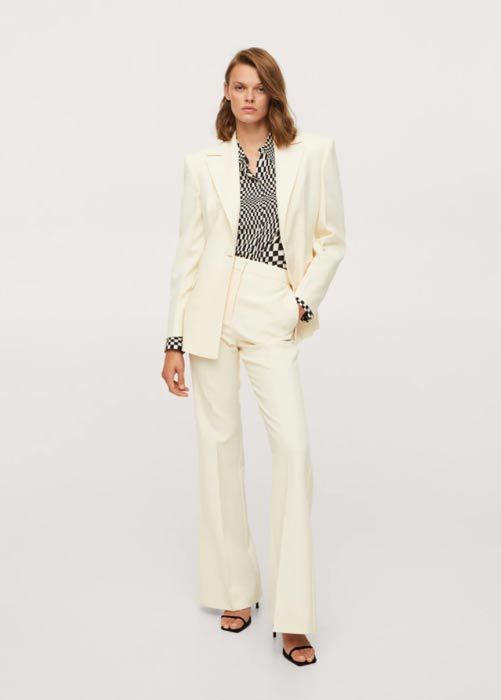 Meghan Markle stuns in slick power suit to reunite with Princess ...