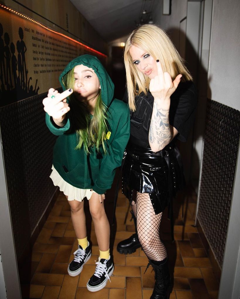 Avril Lavigne puts on very cheeky display in daring outfit that divides ...