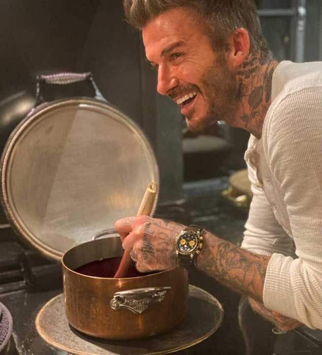 David Beckham looks so dapper as he shows off his impressive chef ...