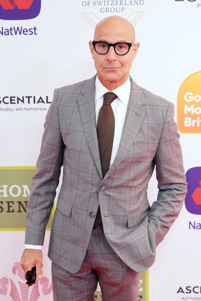 Amal and George Clooney look besotted as they lead the star-studded ...