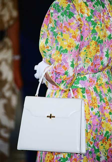 Queen Elizabeth II’s best handbag moments - do you remember these? | HELLO!