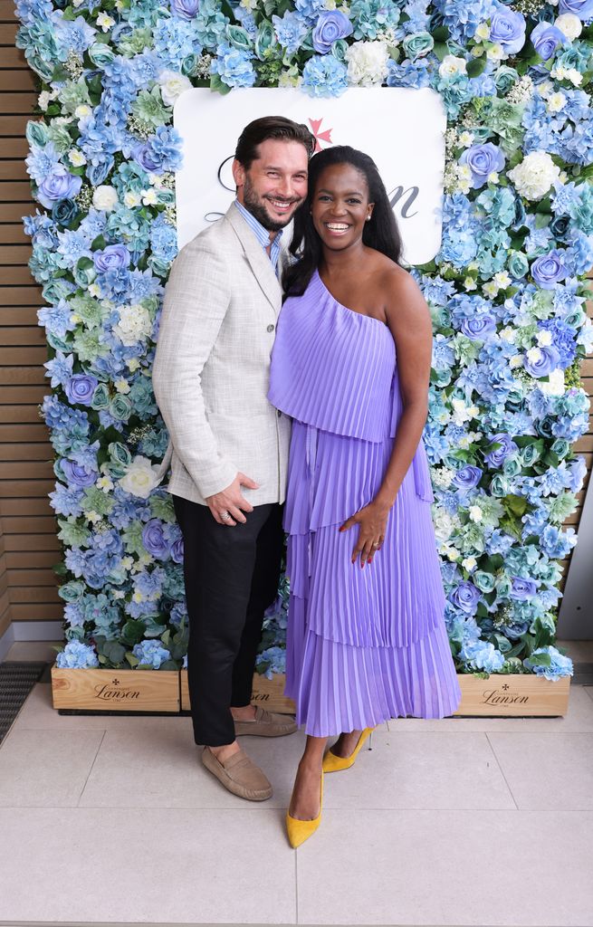 Pregnant Oti Mabuse looks breathtaking in bump-skimming cape dress and ...