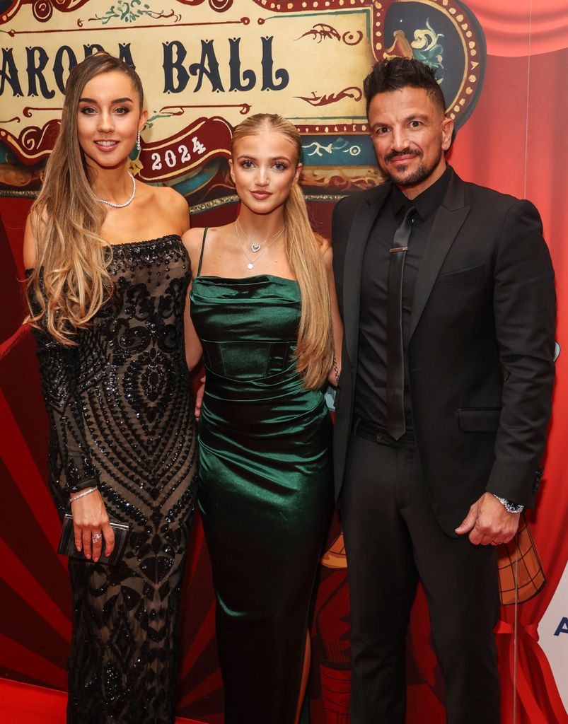 Princess Andre looks glam in velvet dress alongside dad Peter and step ...