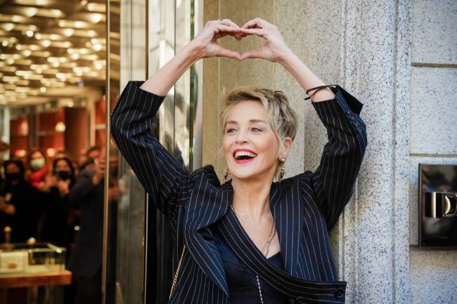 Sharon Stone shows off impressive physique in figure-hugging dress as ...