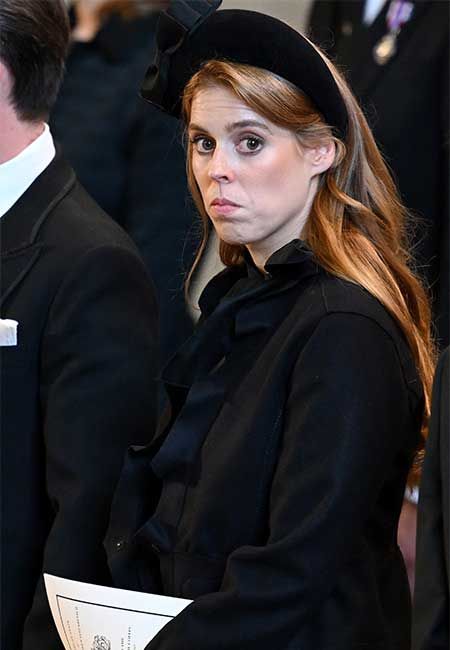 Princess Beatrice is the picture of composure in statement headpiece ...