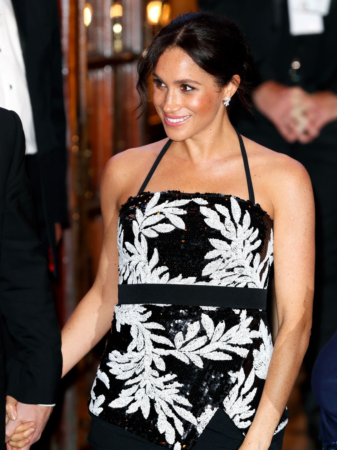 Meghan Markle rocks glitzy mini dress and Hollywood hair to party in ...
