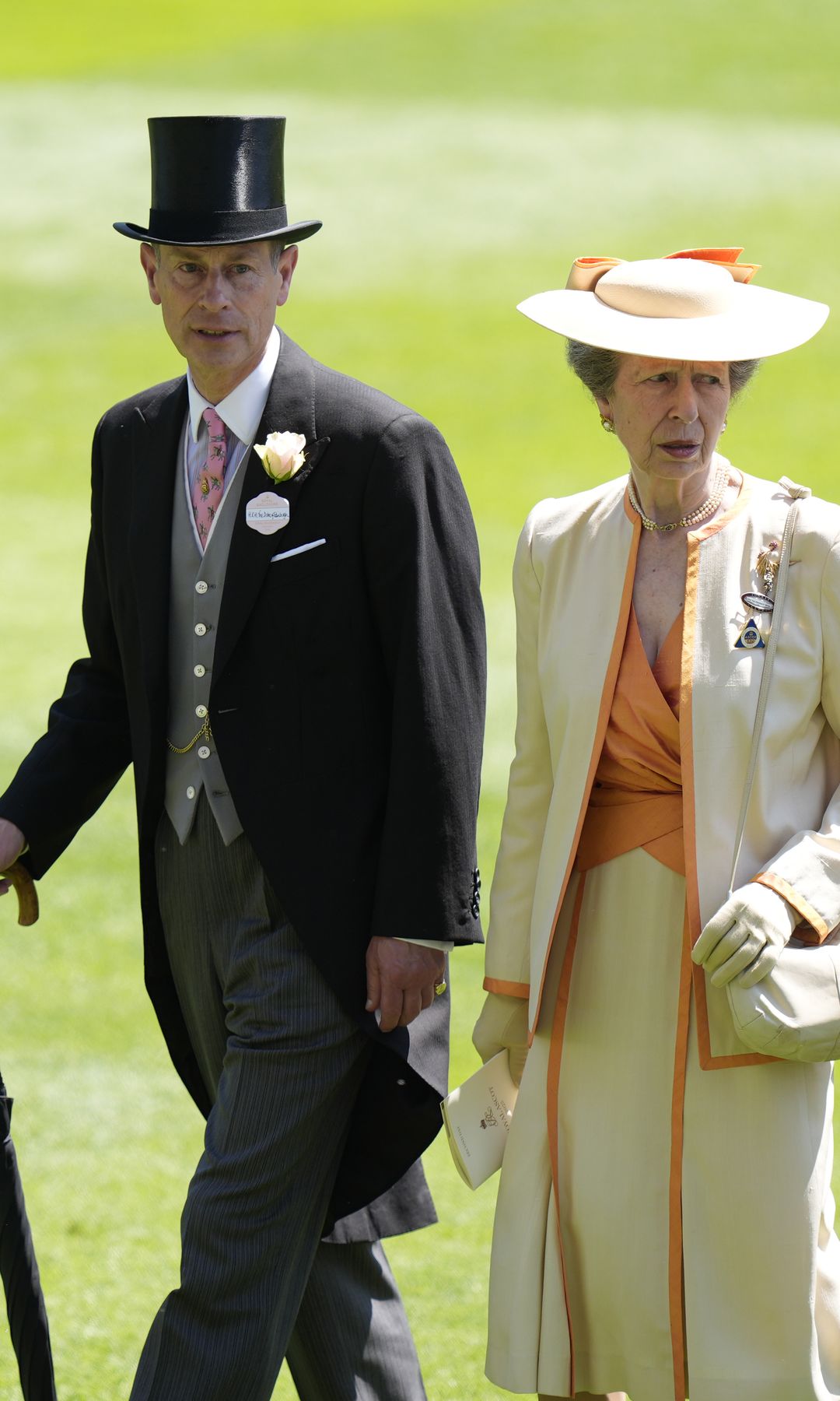 Princess Anne battles soaring temperatures in iconic Ascot silk wrap ...