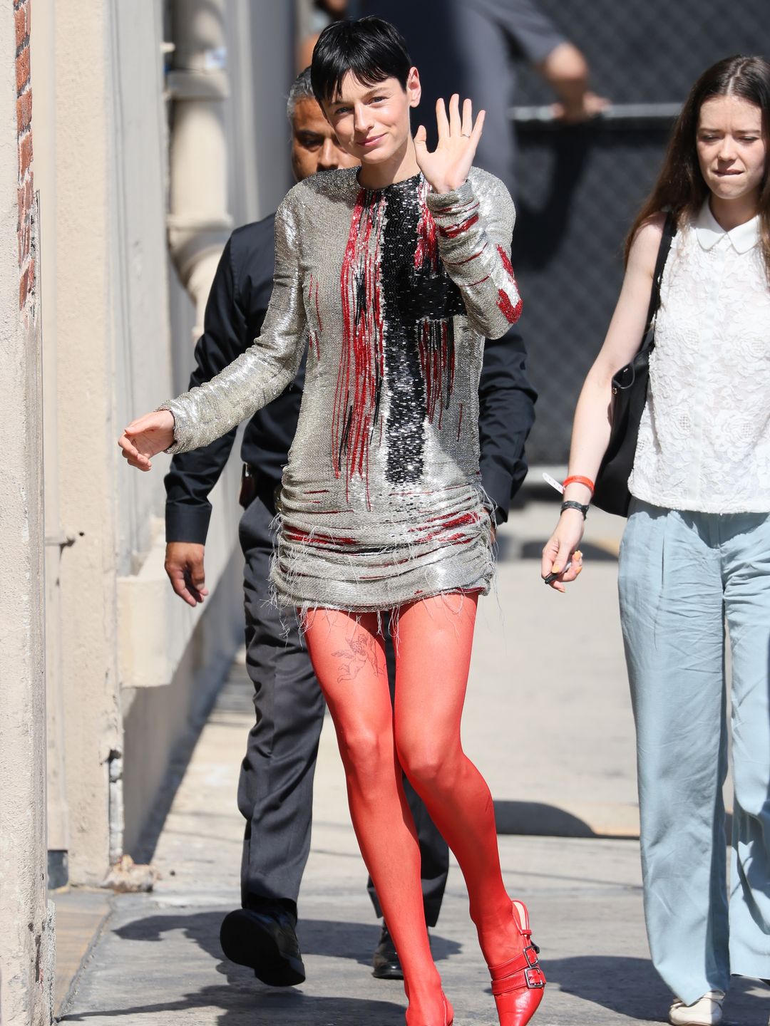 Jenna Ortega's red tights and 'no trousers' look is completely London ...