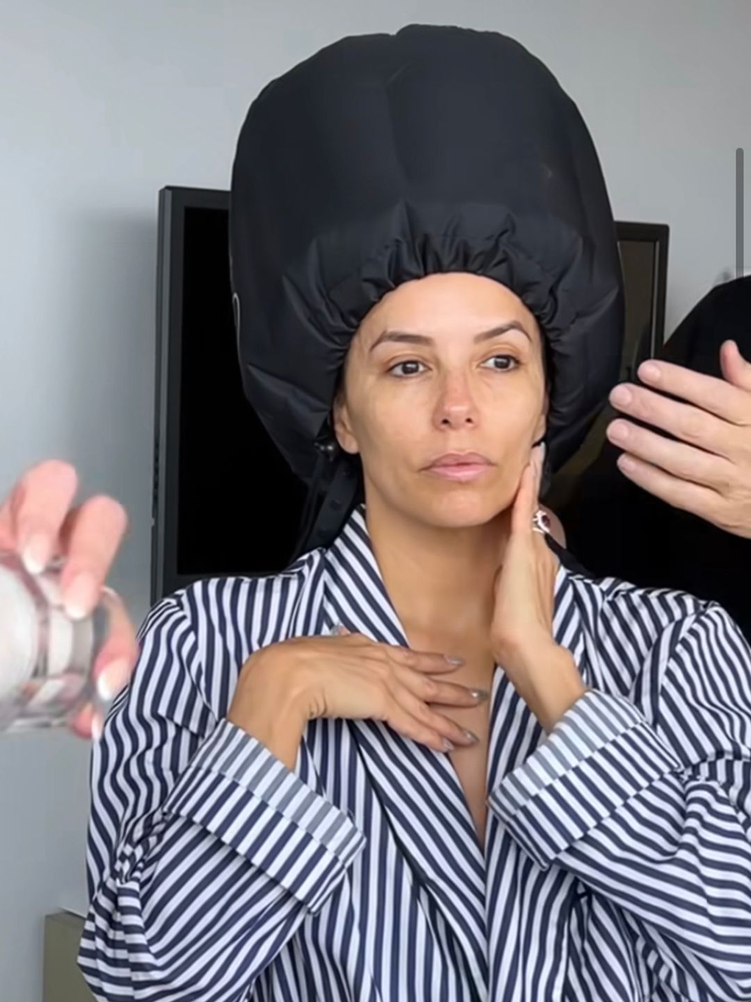 Eva Longoria, 48, looks fresh-faced as she poses in just a robe | HELLO!