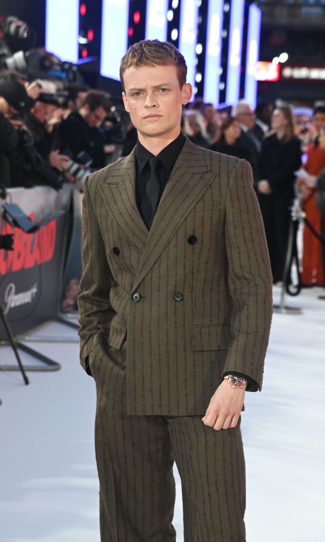 Pierce Brosnan and Tom Hardy cut stylish figures as they lead stars at ...