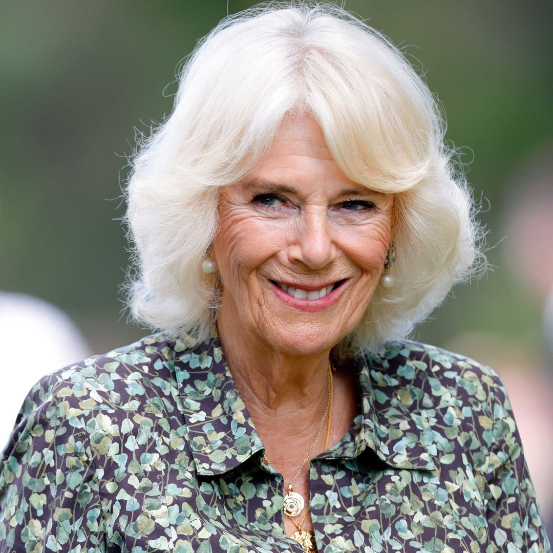 Queen Camilla dons the boldest emerald green outfit to join King ...