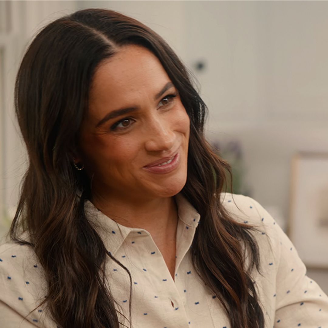 Princess Lilibet's cherubic face seen as she waddles in beekeeping ...