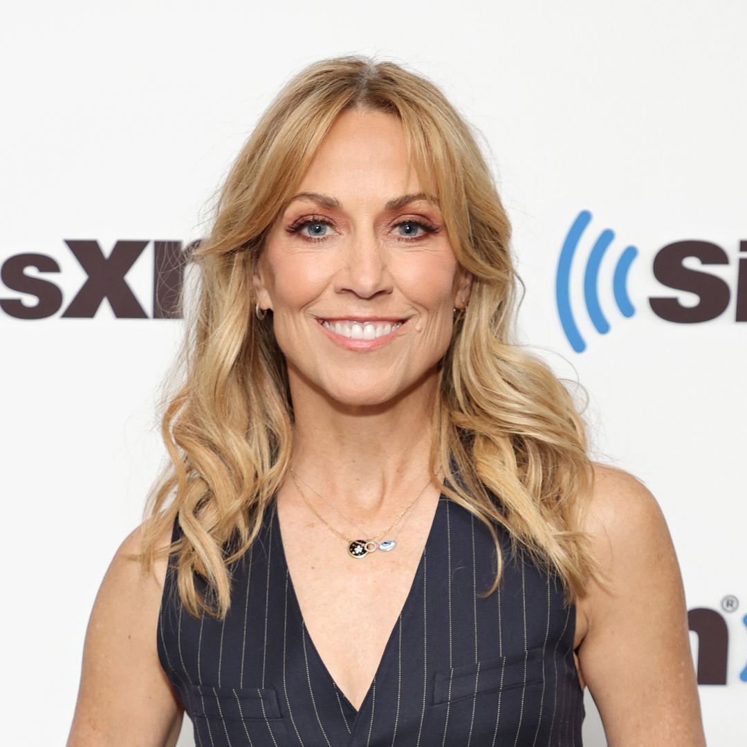 Sheryl Crow's young sons almost tower over her in rare public ...