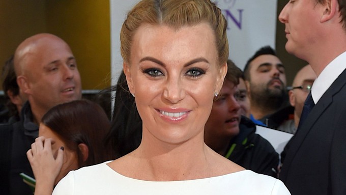 Billi Mucklow wows in festival-themed bridal mini dress and cowboy ...