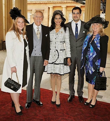 Bruce Forsyth receives his knighthood by the Queen in Buckingham Palace ...