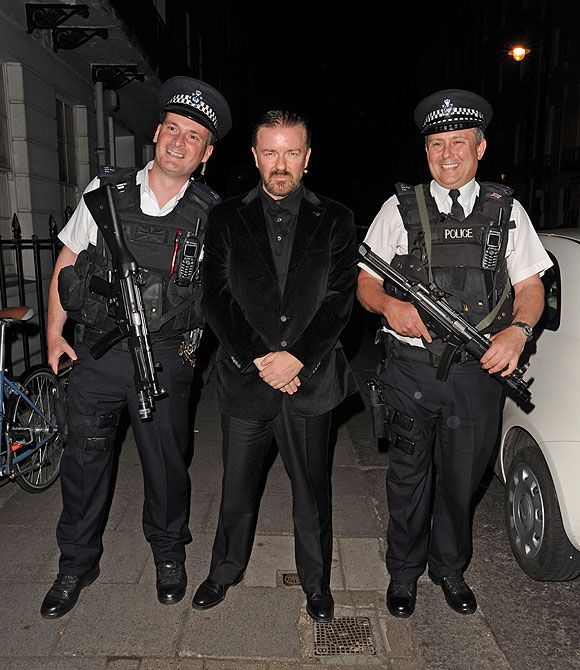 Ricky Gervais poses for pictures with policemen | HELLO!