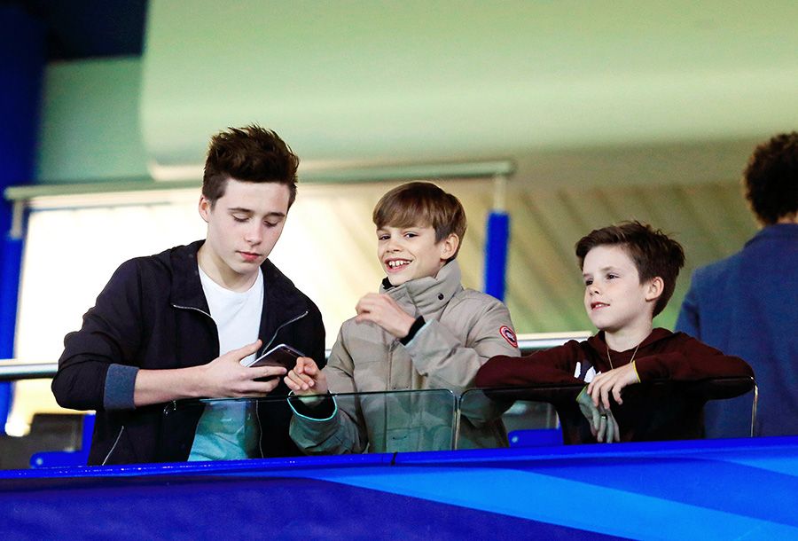 David Beckham and sons at football match | HELLO!