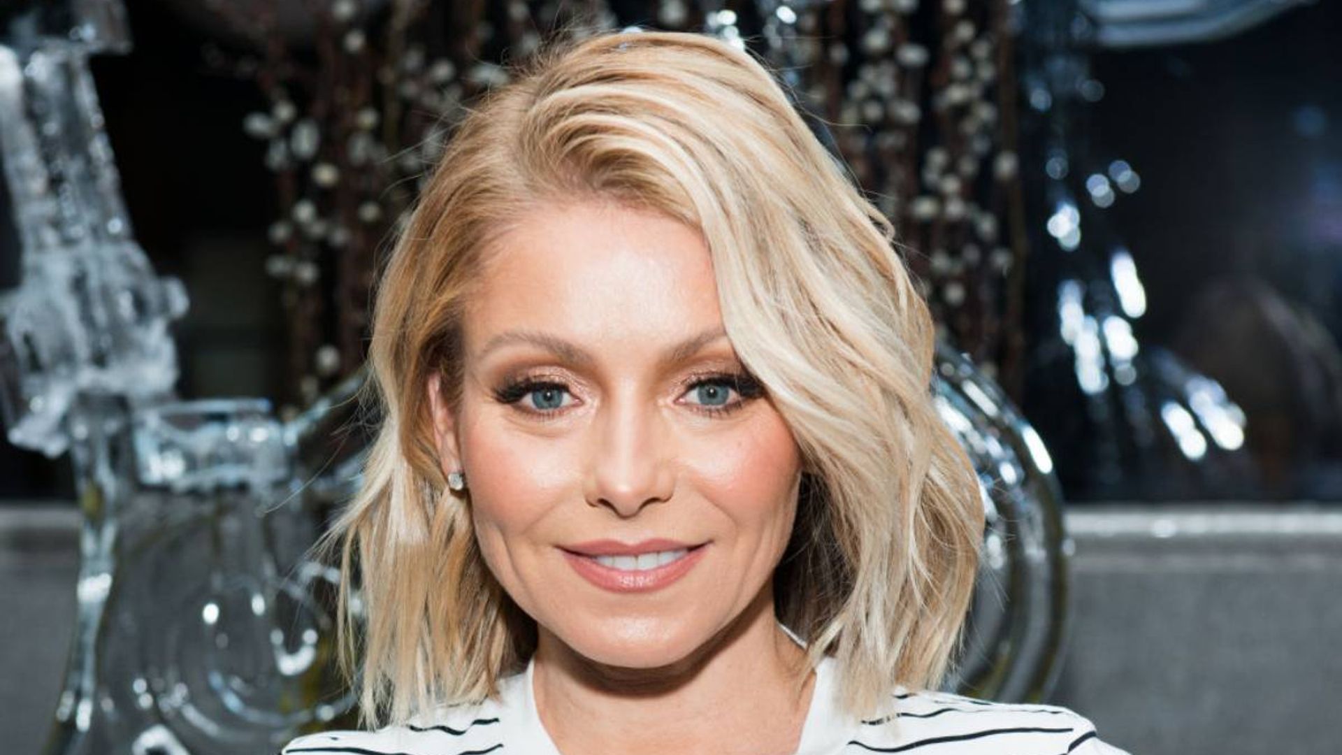 Kelly Ripa bares her washboard abs in two-piece Halloween outfit | HELLO!