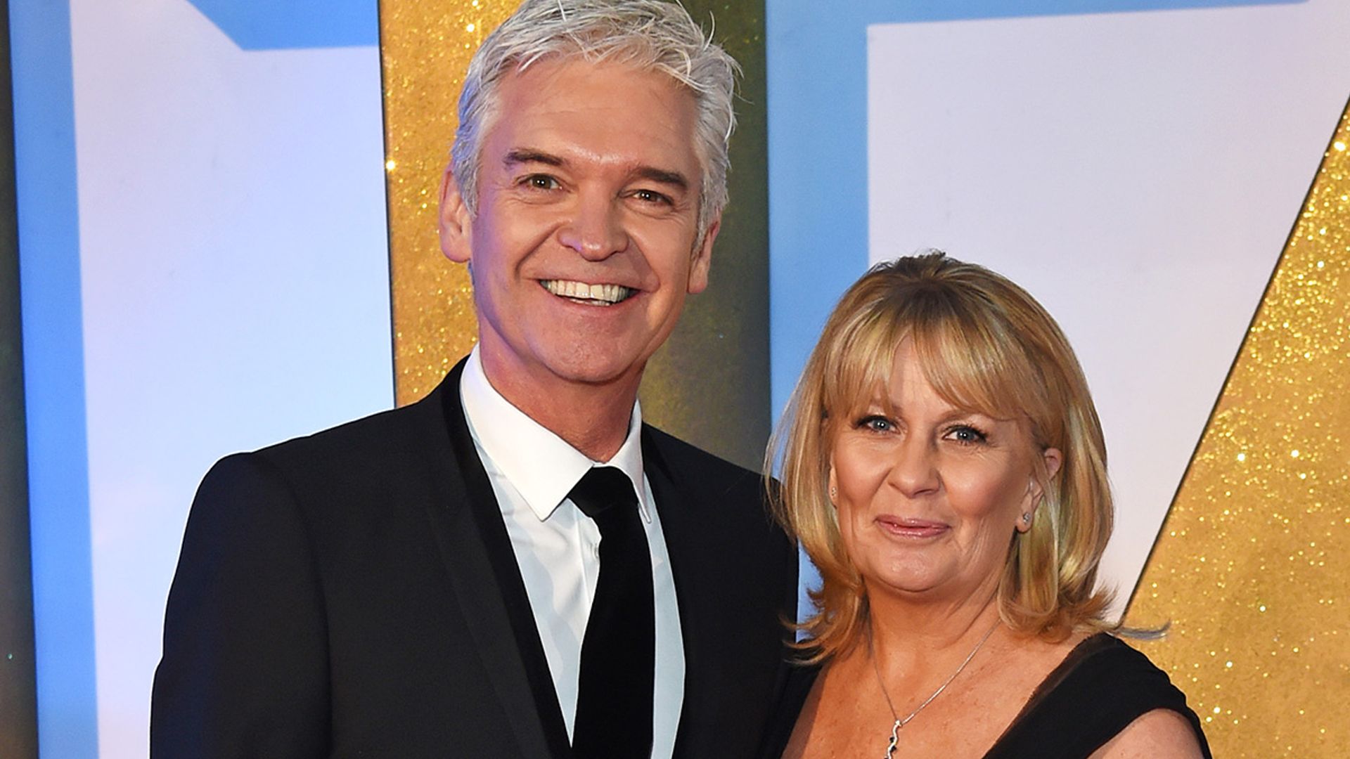 Phillip Schofield pictured with huge bunch of flowers on 28th wedding ...