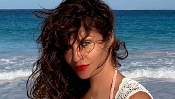 Helena Christensen stuns in daring swimsuit for outdoor soak | HELLO!
