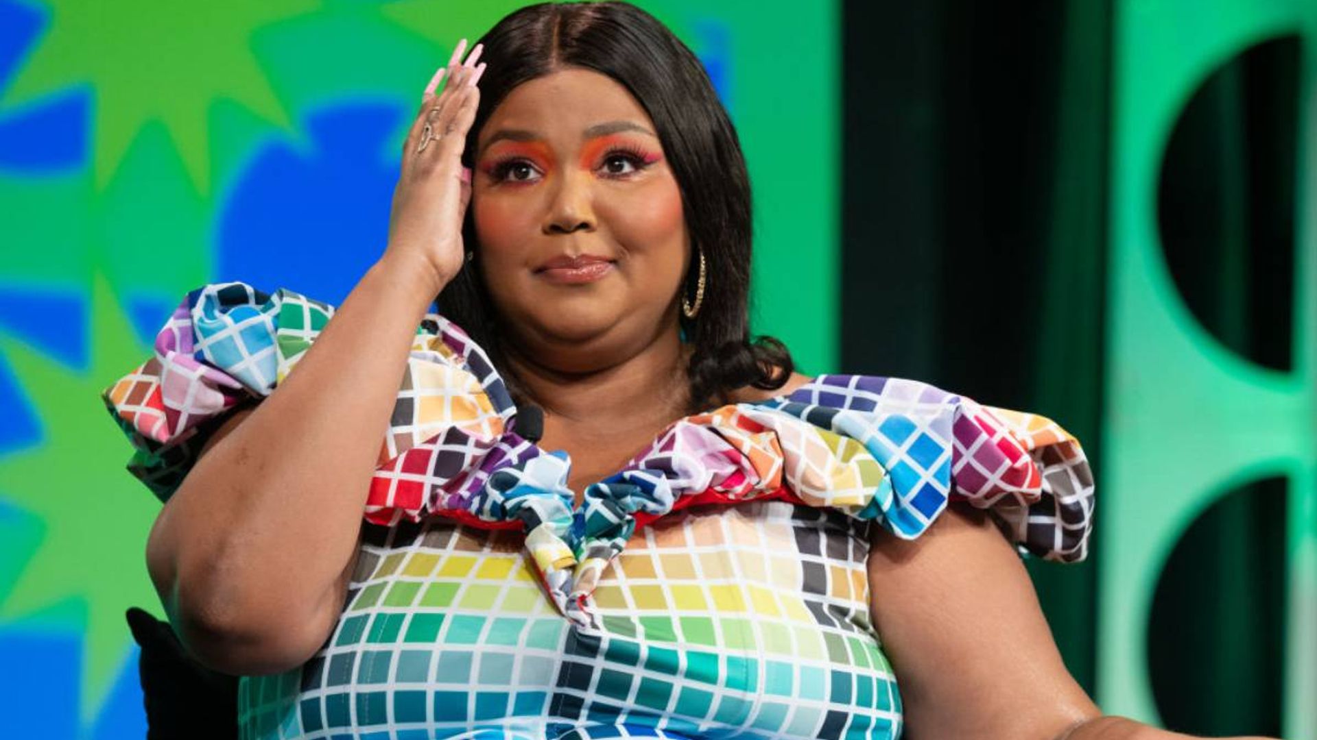 Lizzo stuns fans with appearance in skintight latex dress as she makes ...