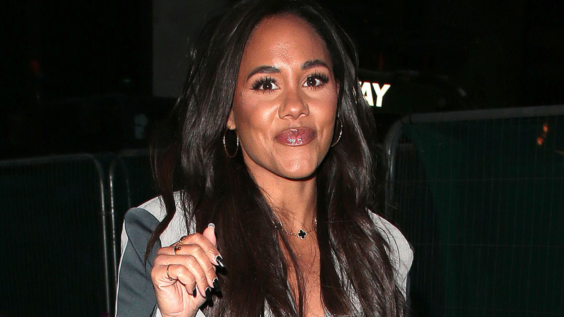 Alex Scott looks divine in figure-flattering grey suit with plunging ...