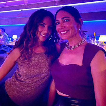 Simon Cowell's fiancée Lauren Silverman dons crop top and leather skirt ...