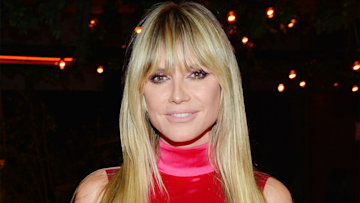 AGT's Heidi Klum poses in fiery red lingerie to mark a very impressive ...