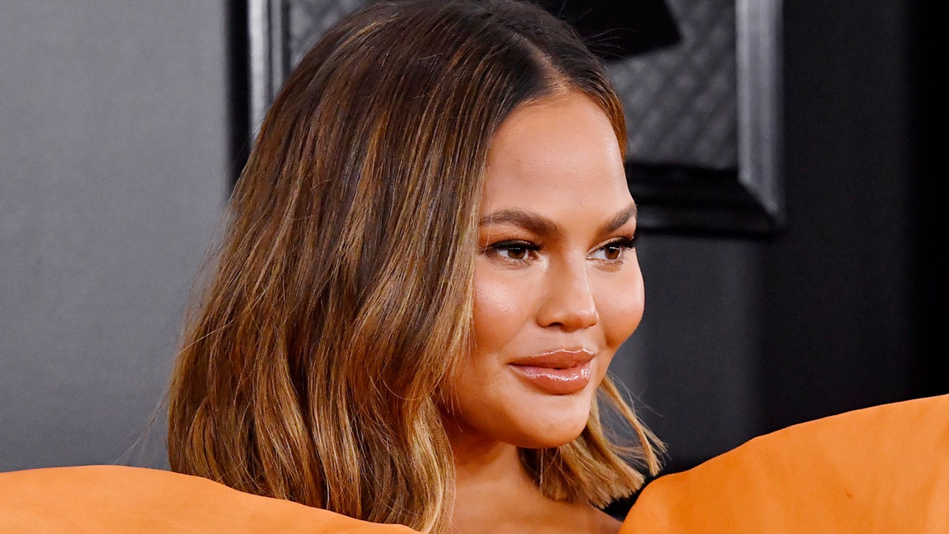 Pregnant Chrissy Teigen shows off huge baby bump in bikini: 'Please ...