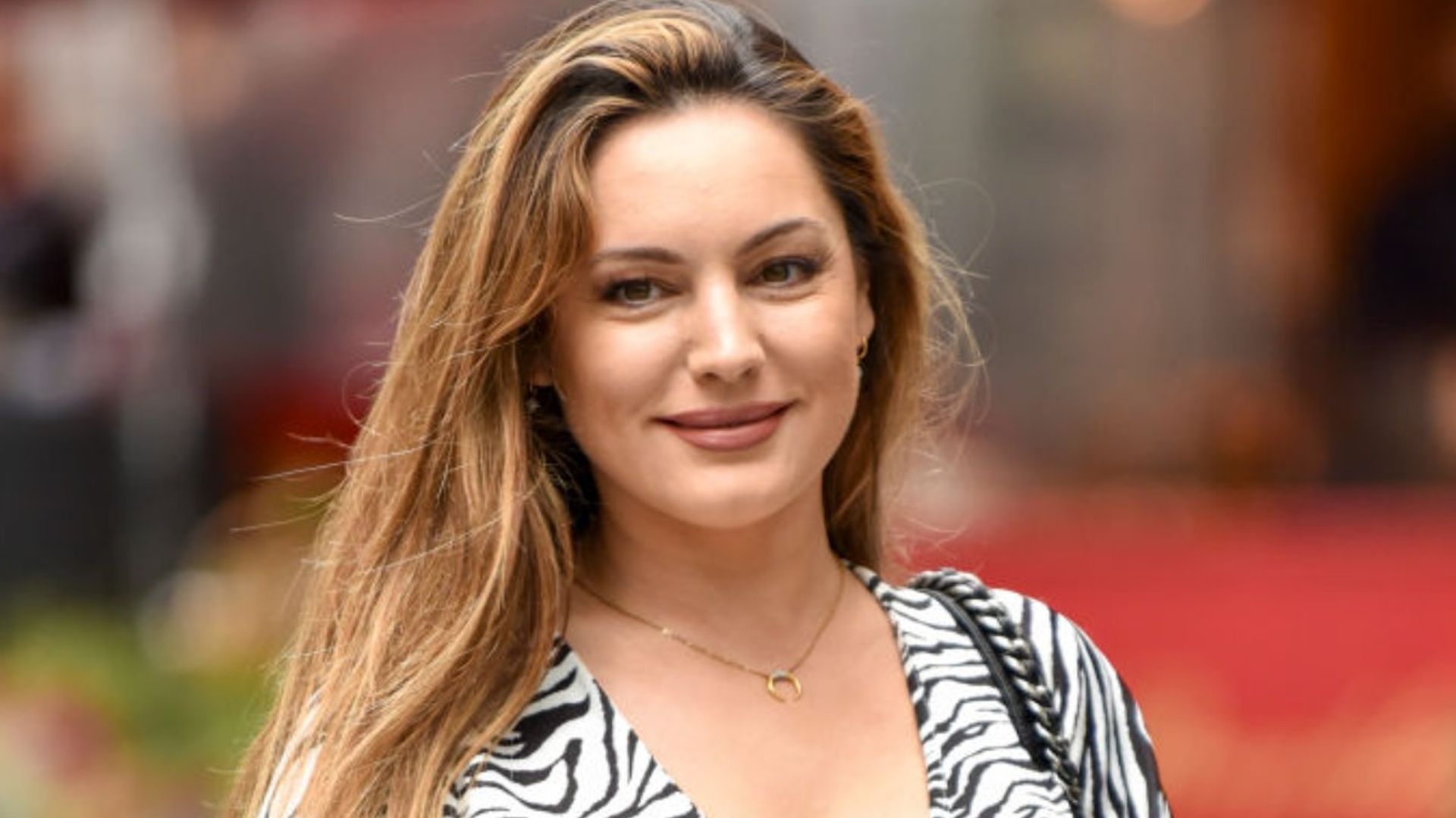 Kelly Brook wows fans in a plunging zebra print dress – and it's just £ ...