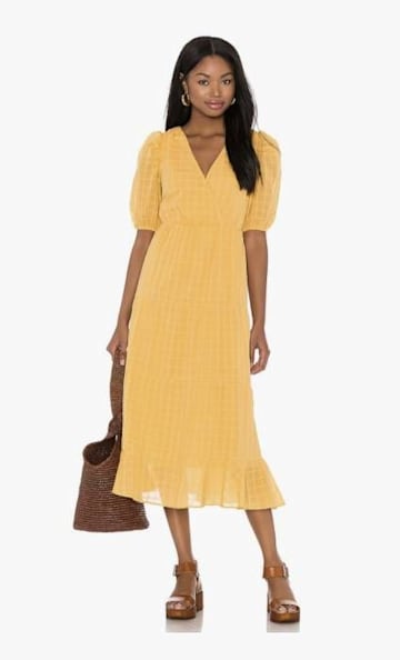 Kelly Ripa dazzles in the dreamiest yellow suede dress - and we found ...