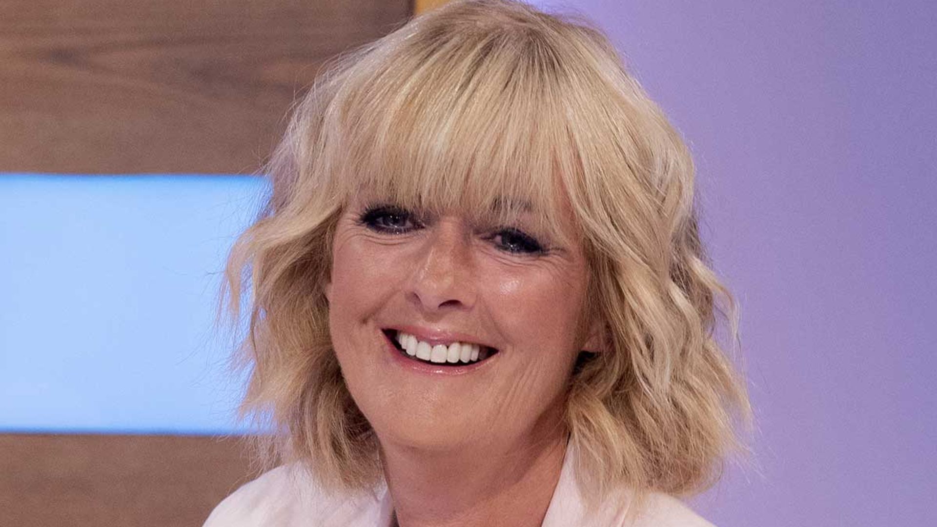 Jane Moore styles flirty rainbow dress in most unexpected way | HELLO!