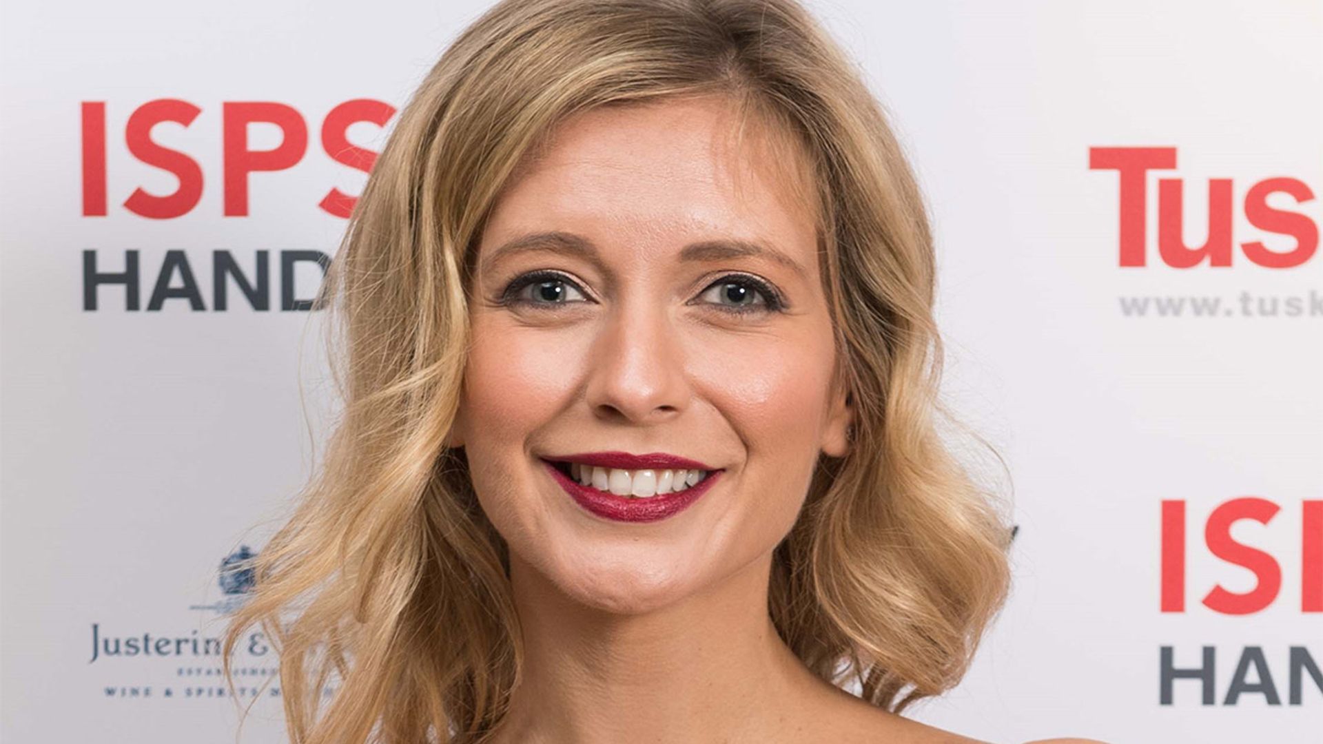 Rachel Riley styles her baby bump in glam red dress that's selling out ...