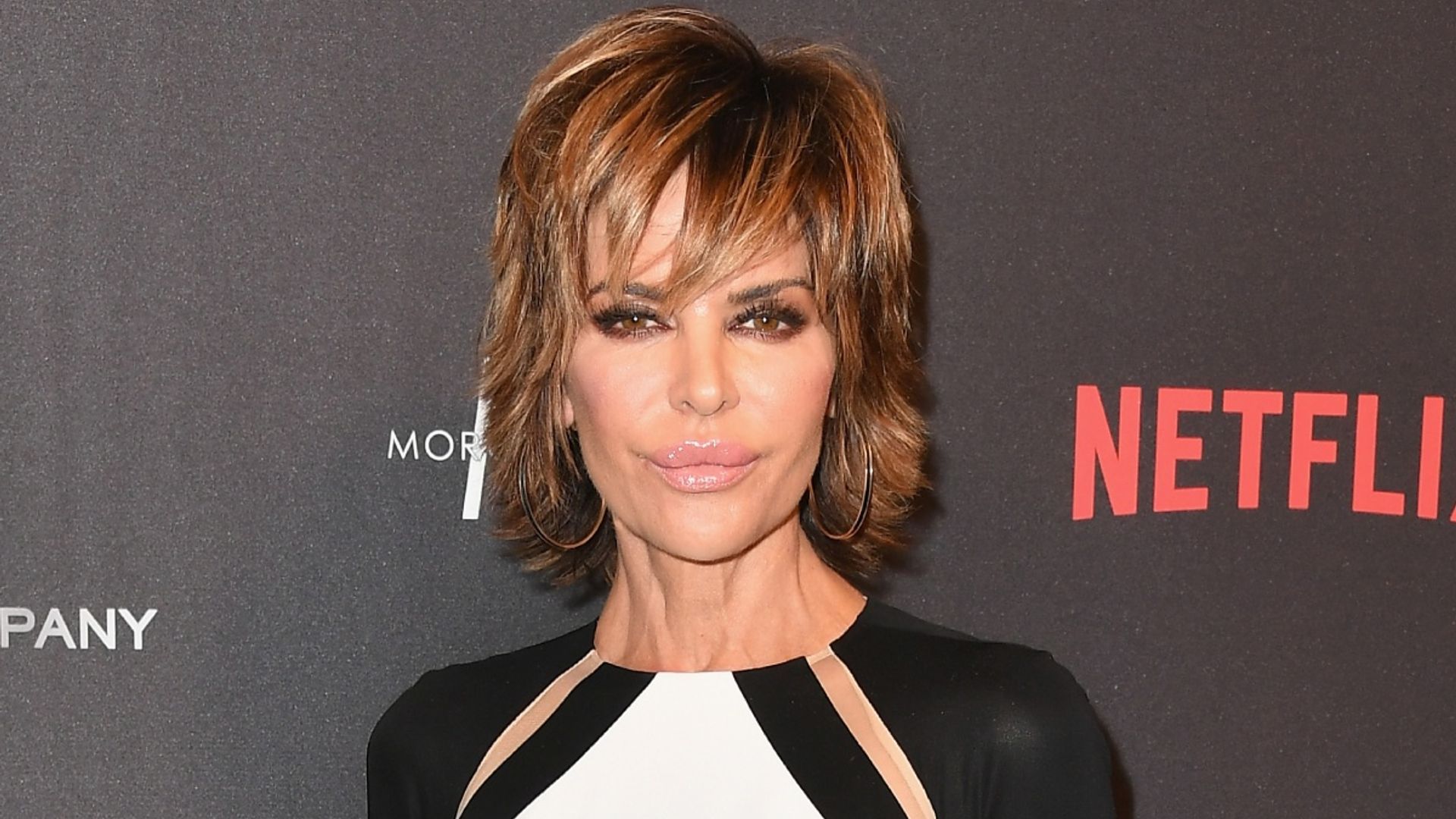 Lisa Rinna has legs for days in black high-cut swimsuit as she shares ...