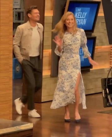 Kelly Ripa nearly suffers a wardrobe malfunction in a figure-flattering ...