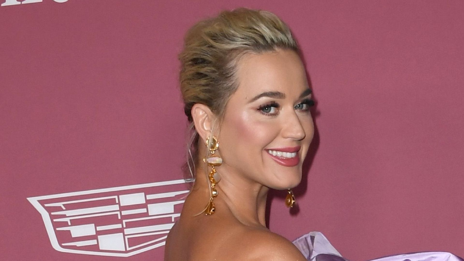 Katy Perry marks milestone moment in curve-hugging gown with a high ...