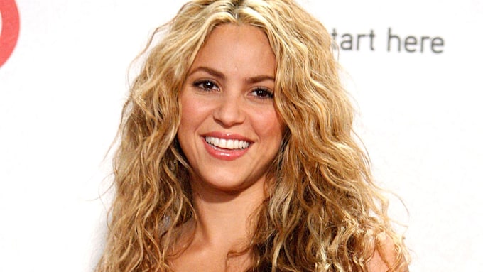 Shakira has legs for days in cut-out mini dress in gorgeous new photo ...