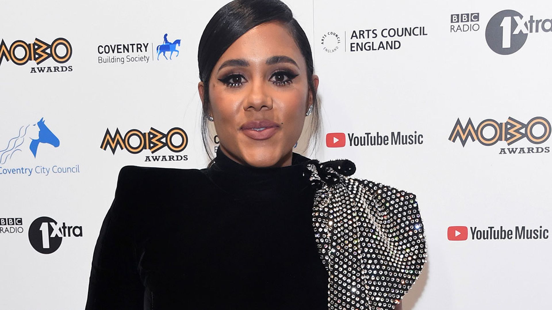 Alex Scott shows off her toned physique in sizzling little black dress ...