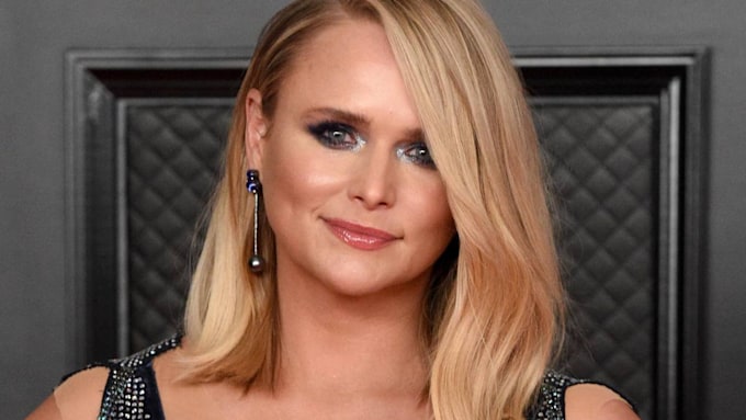 Miranda Lambert displays enviable figure in low-cut mini dress as she ...