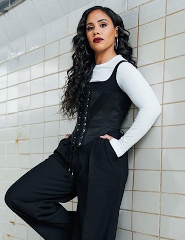 Alex Scott wows in knee-high leather boots and daring dress | HELLO!