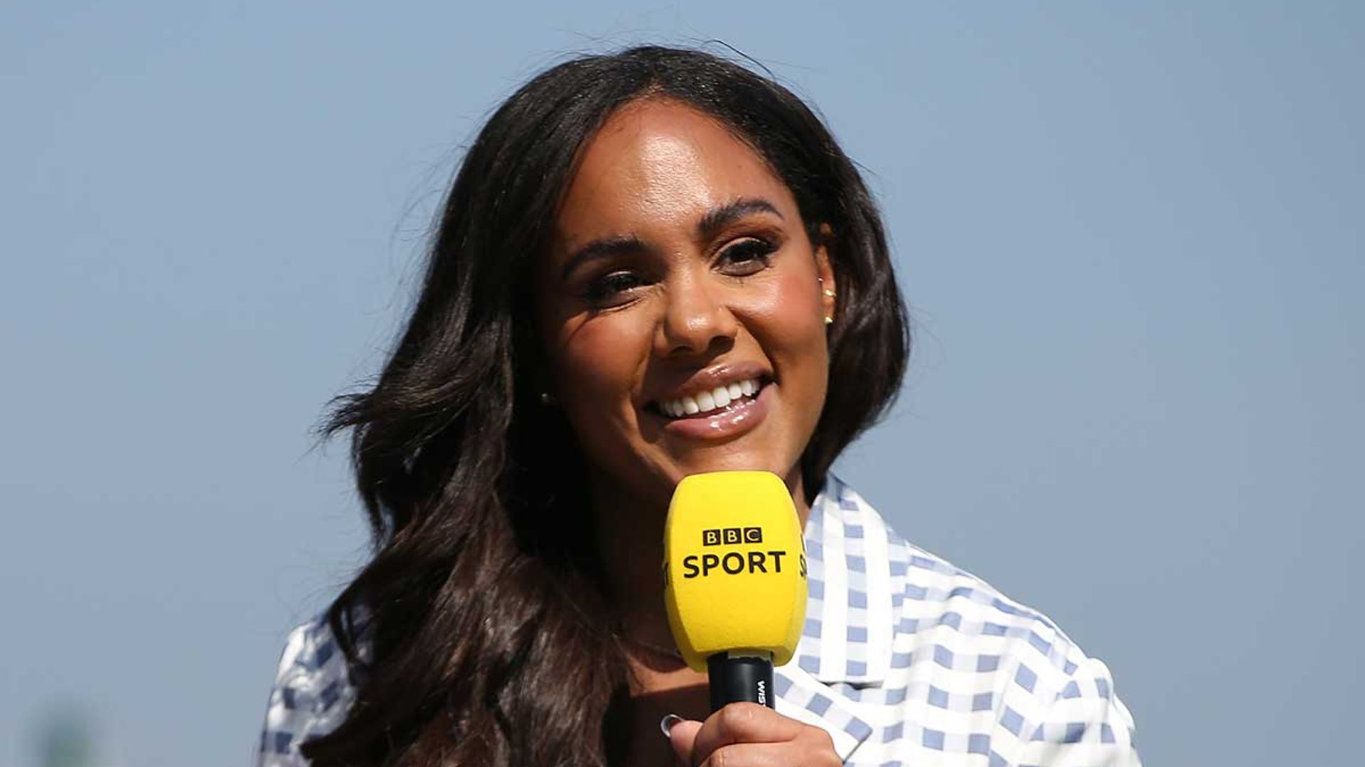 Alex Scott sizzles in baby blue PVC trousers to announce some exciting ...