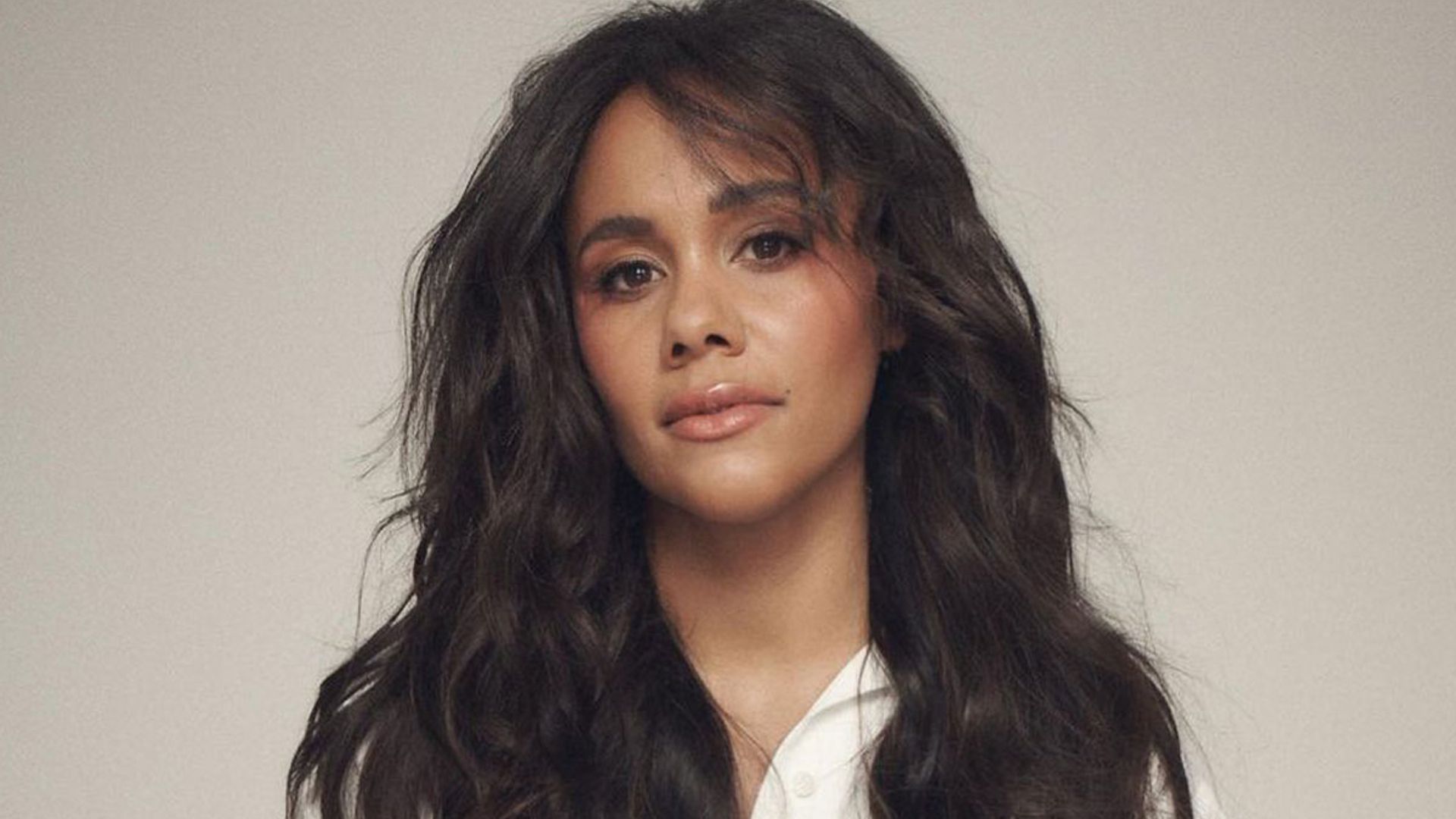 Alex Scott surprises in V-neck mini dress - and most daring platform ...