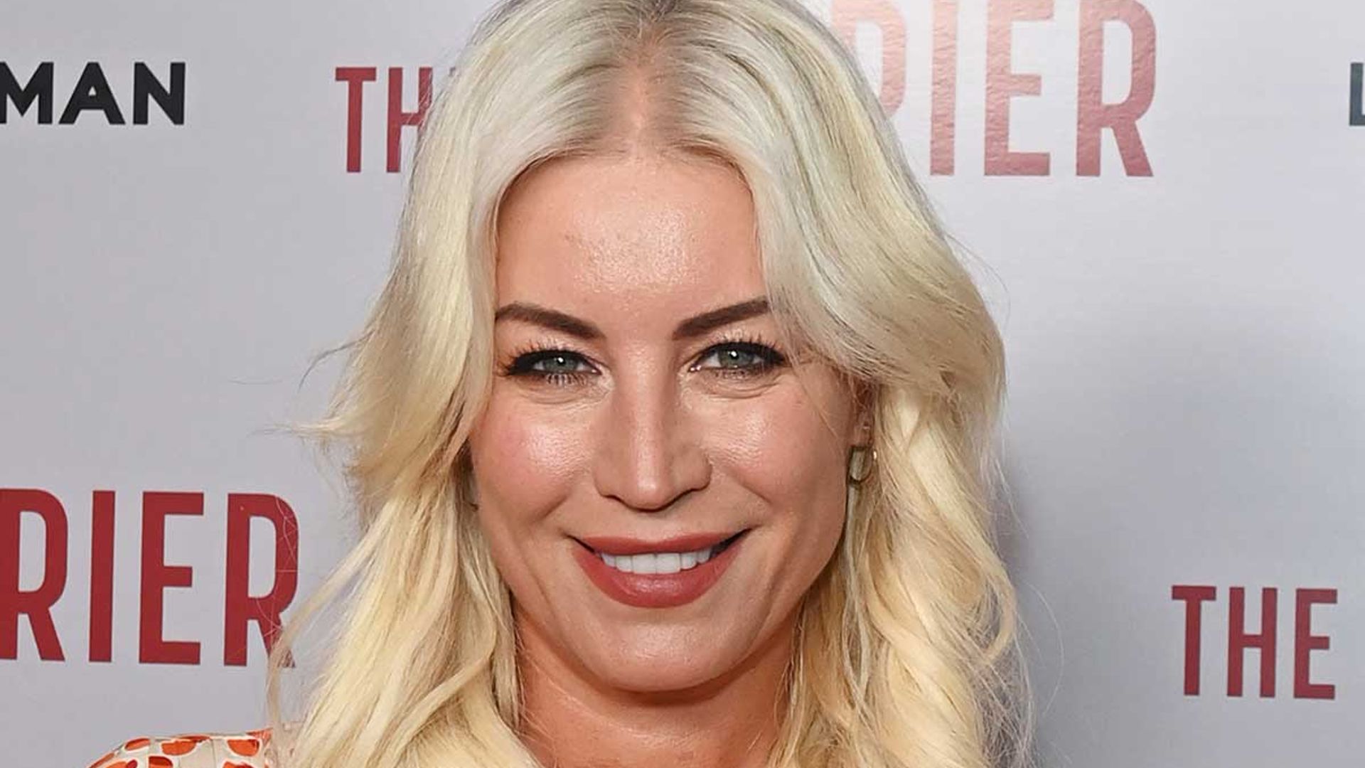 Denise Van Outen turns up the heat in risqué red dress as she parties ...
